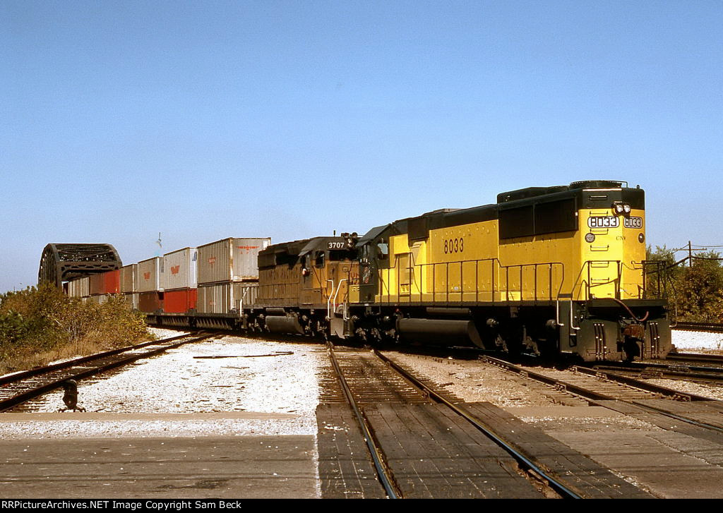 CNW 8033 and UP 3707
